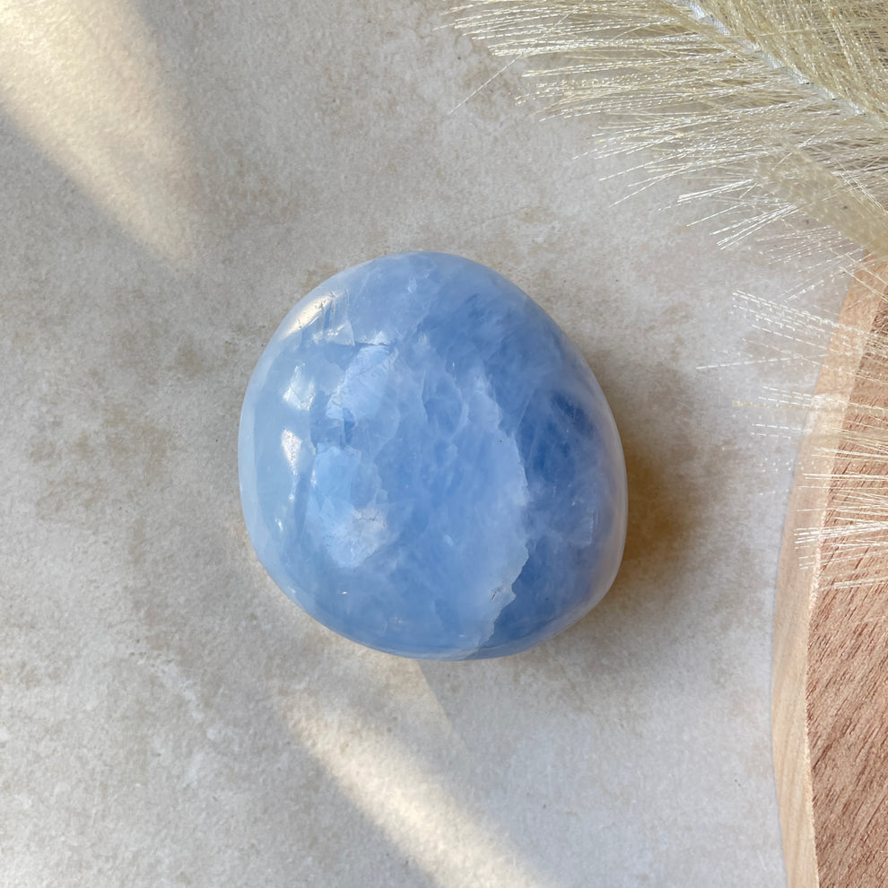 Blue Calcite Palm Stone – Milky Peach Studio